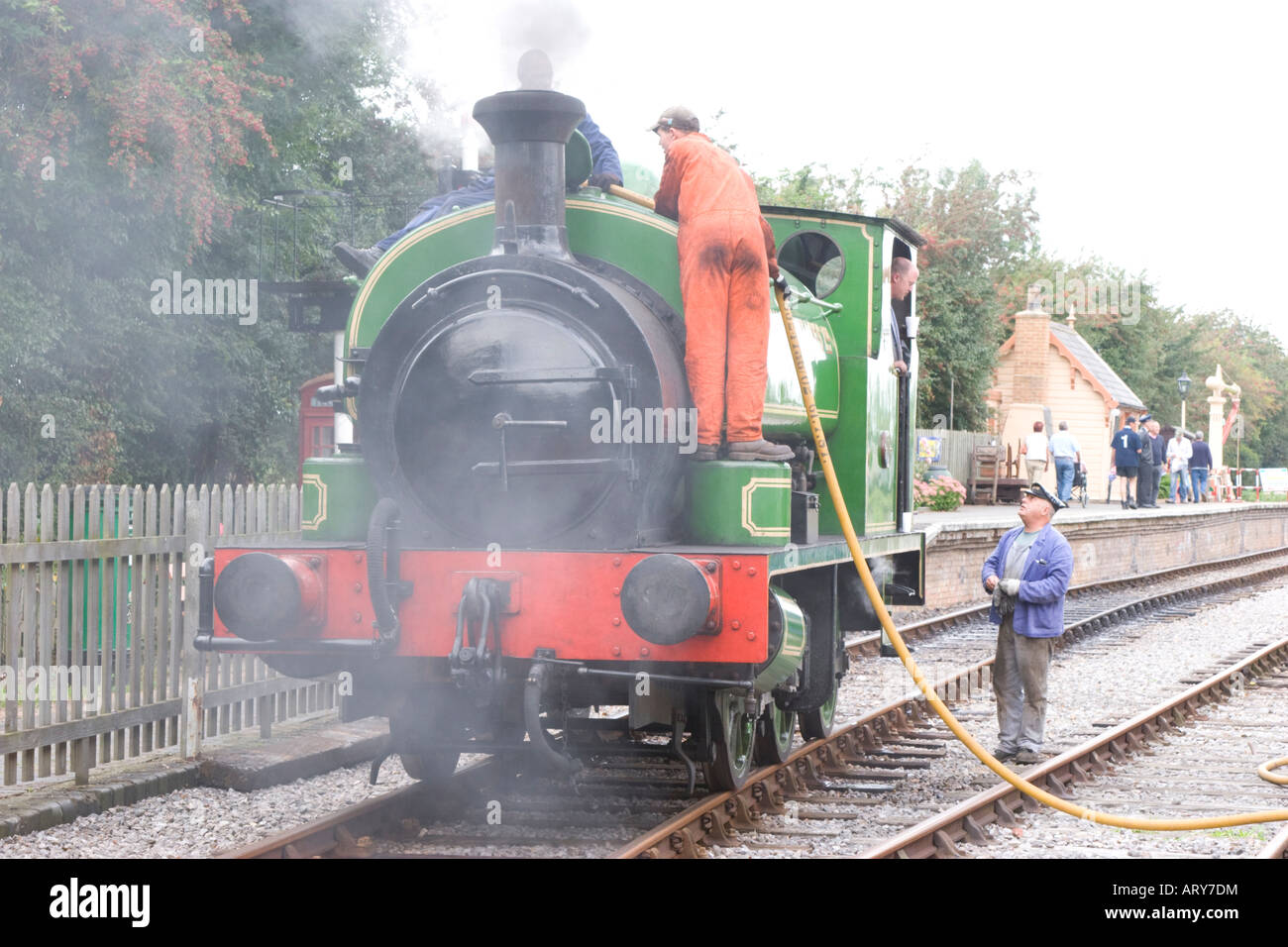 Men outside train stopped hi-res stock photography and images - Alamy