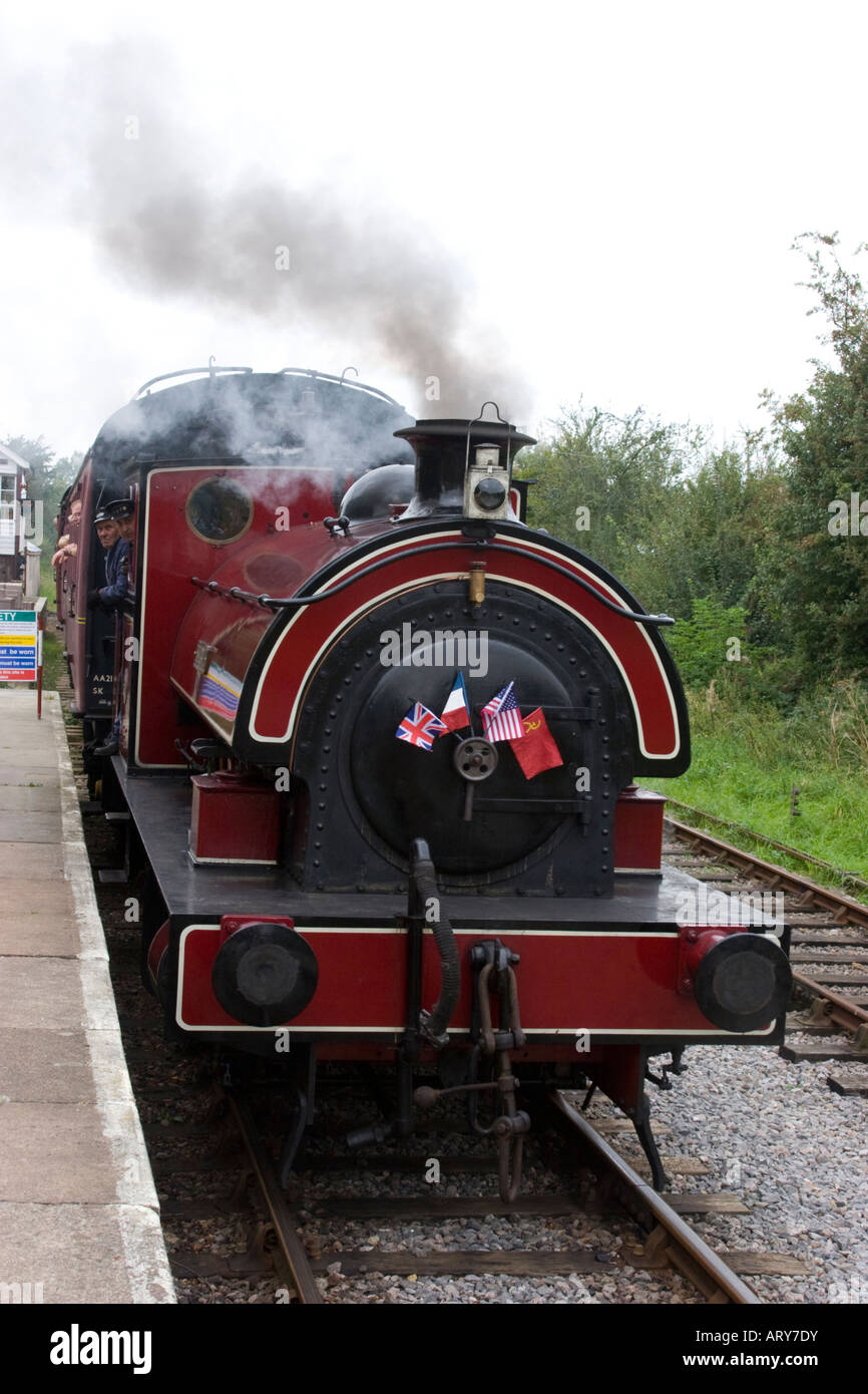 Steam locomotive pulling into the station Stock Photo - Alamy