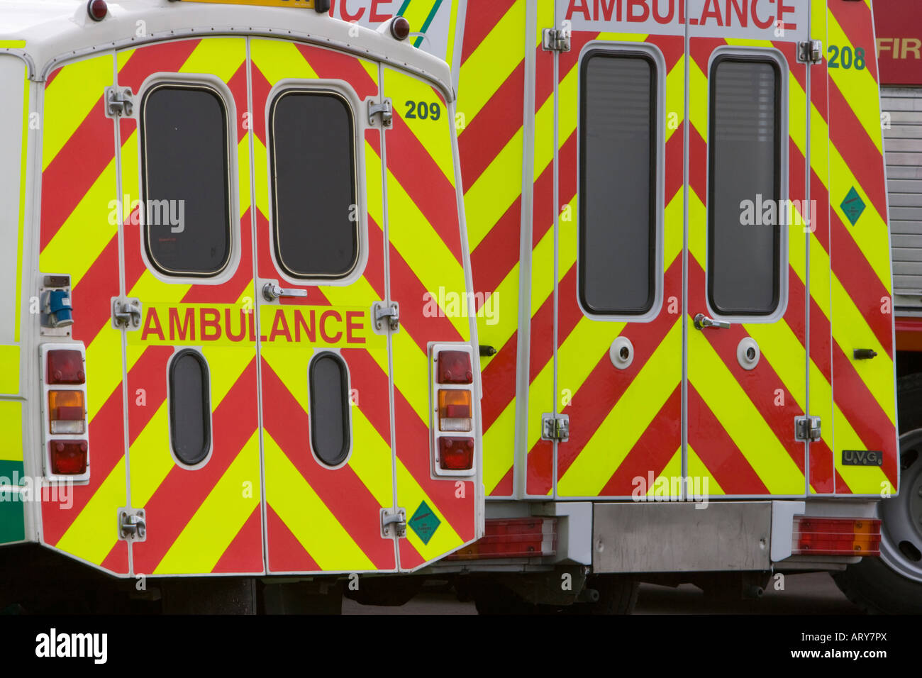 Back end of ambulances showing emergency vehicle striped markings Stock ...