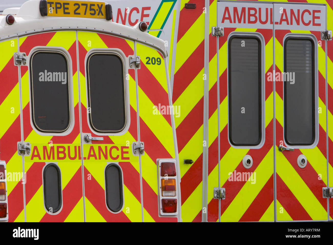 Back end of ambulances showing emergency vehicle striped markings Stock ...