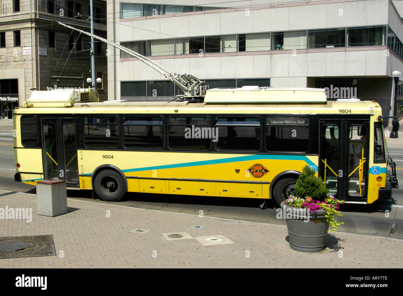Yellow Trolly Bus CAT System in downtown Dayton Ohio Stock Photo - Alamy