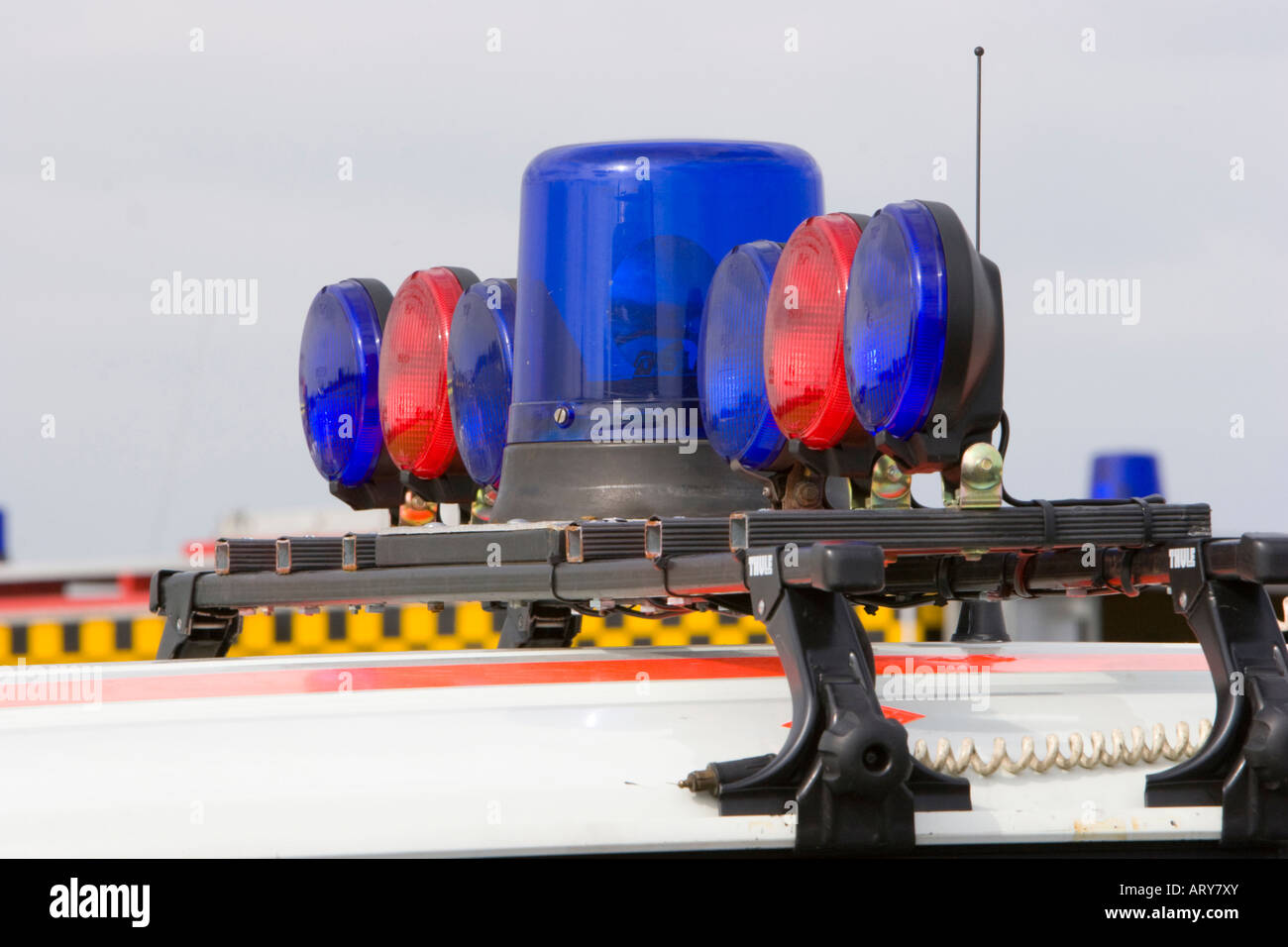 Emergency blue lights mounted on the roof of an emergency service vehicle Stock Photo - Alamy