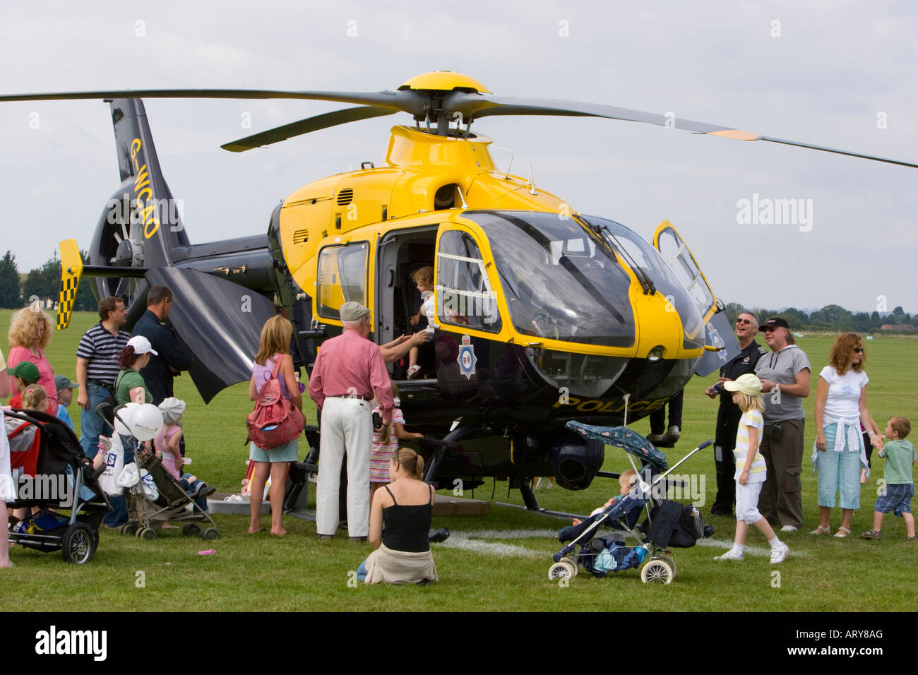 Police helicopter and air ambulance on the ground for public inspection ...