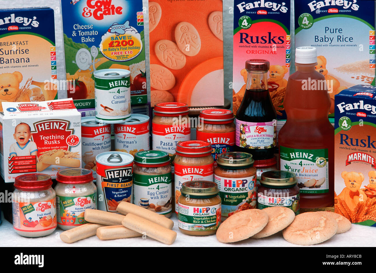 Range of baby foods tins bottles packets UK Stock Photo - Alamy