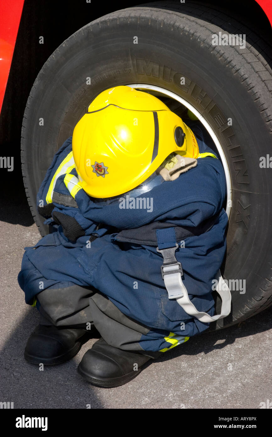 Firefighter's crumpled uniform Stock Photo - Alamy