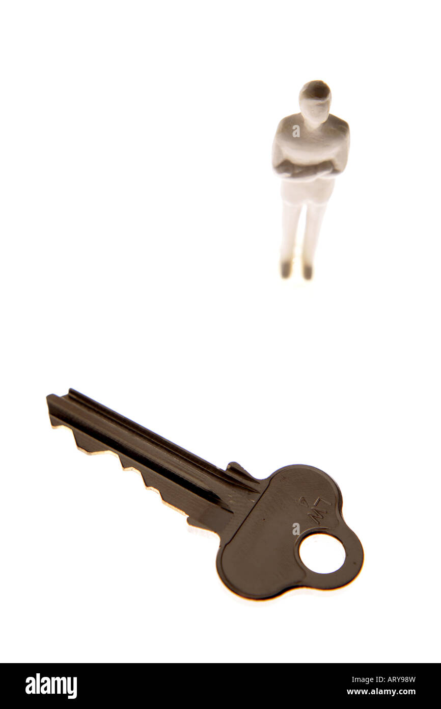 Key and business figure on white Stock Photo - Alamy