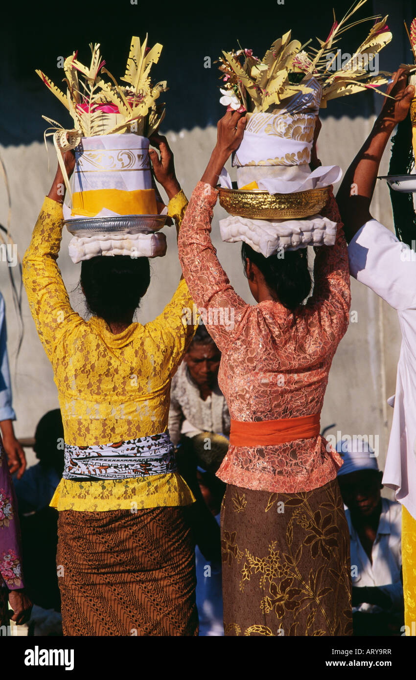 Women carrying offerings at roadside ceremony Stock Photo - Alamy