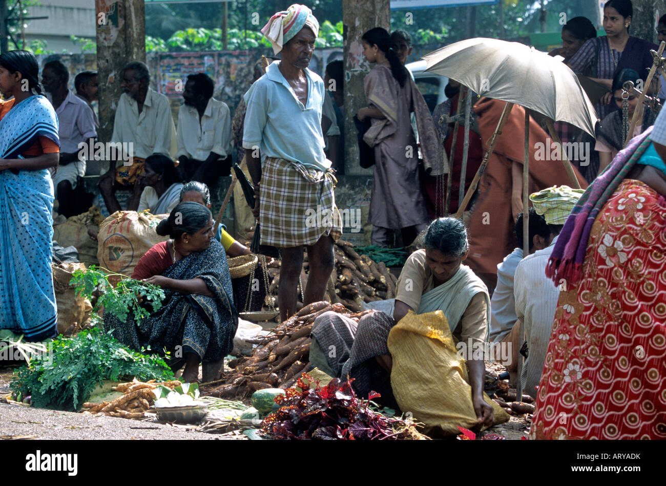 Local villagers selling fresh produce at market Stock Photo - Alamy