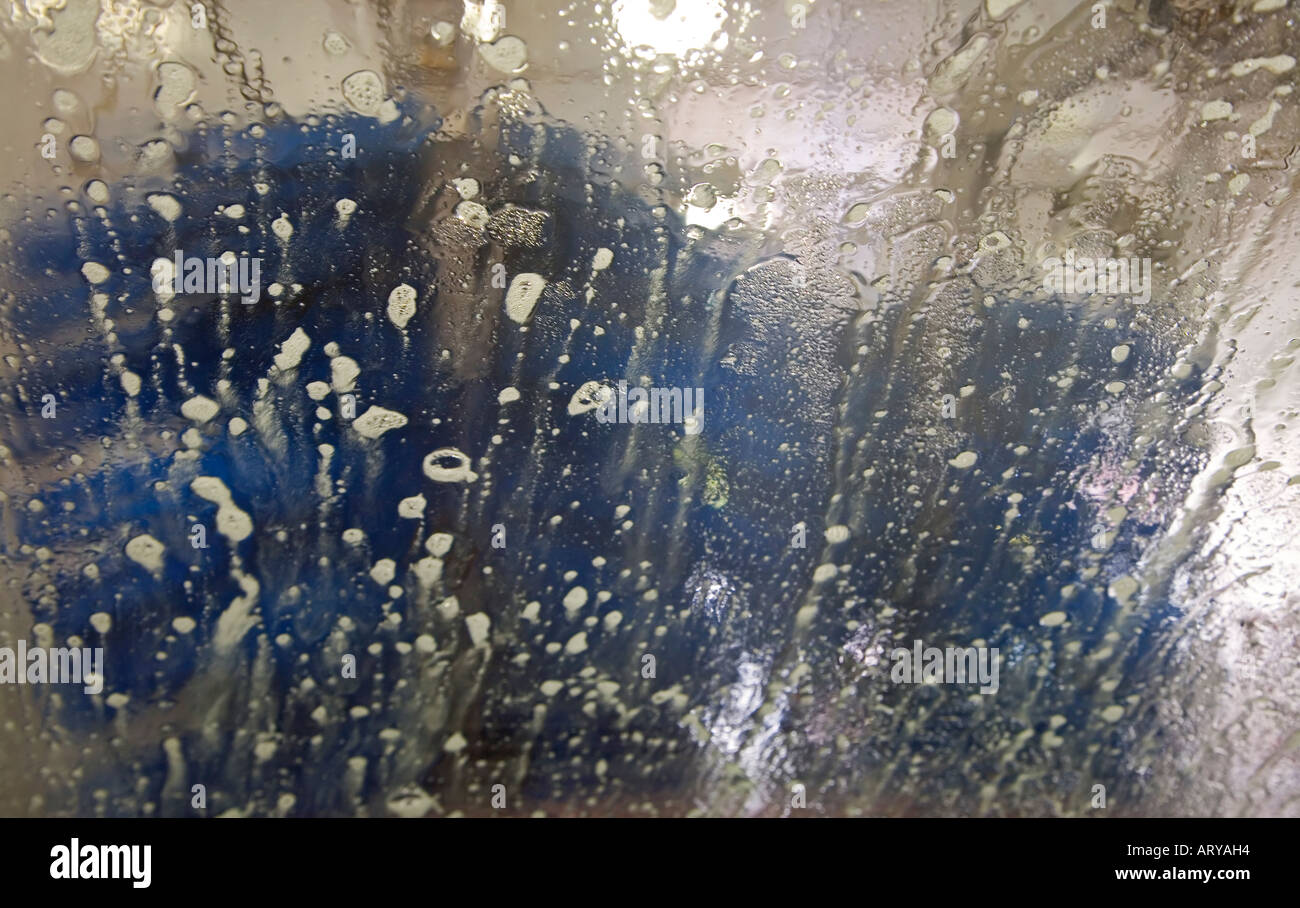 Car window covered in soap suds inside automatic carwash Vancouver ...