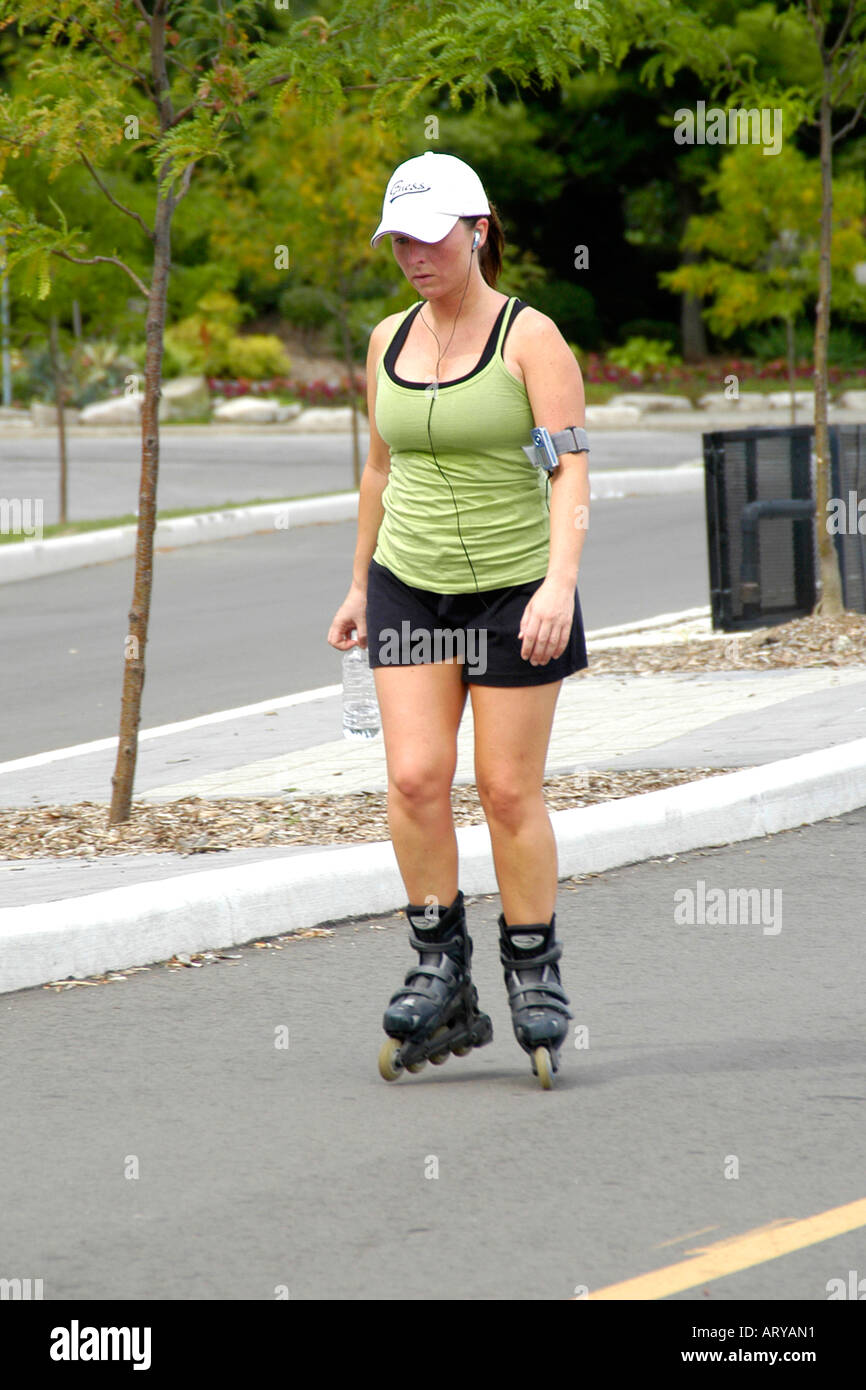 Woman and girl inline skating hi-res stock photography and images - Alamy