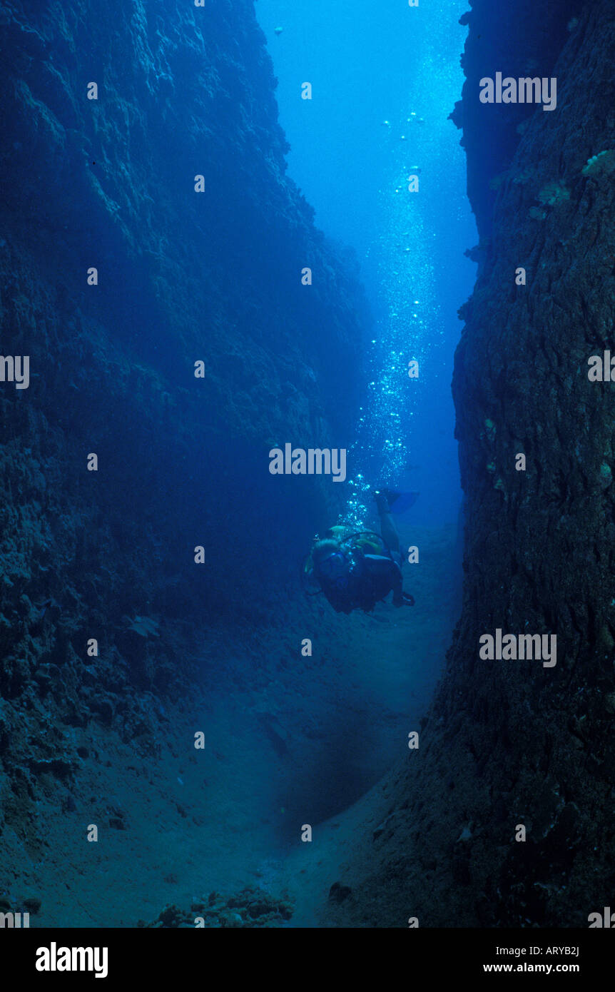 Scuba divers explore lava tubes and other unique geologic formations in ...