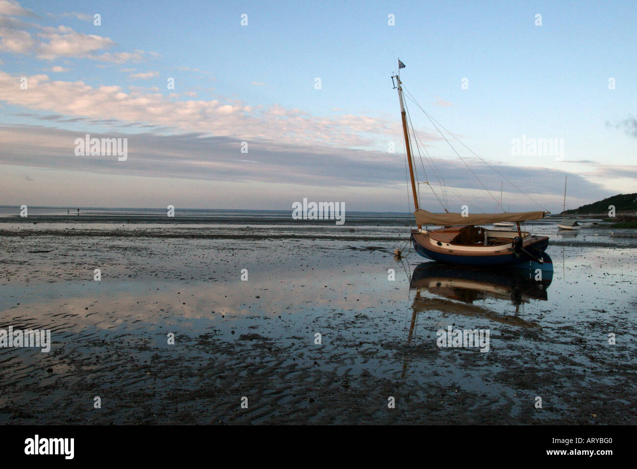 Sailboat at low tide on the tidal flats, Brewster, Massachusetts Stock ...