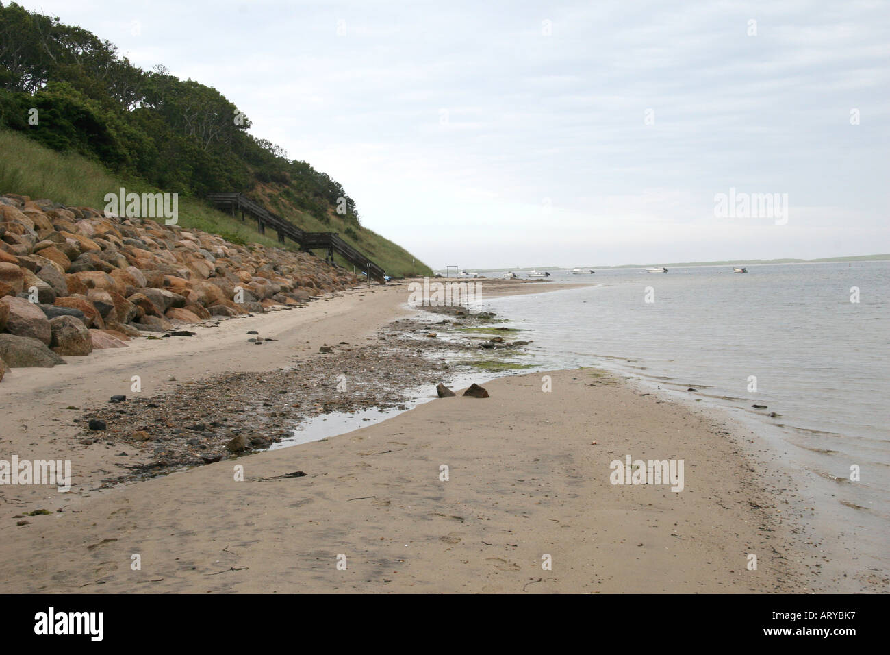 Beach and rock retaining wall at Monomoy National Wildlife Refuge ...