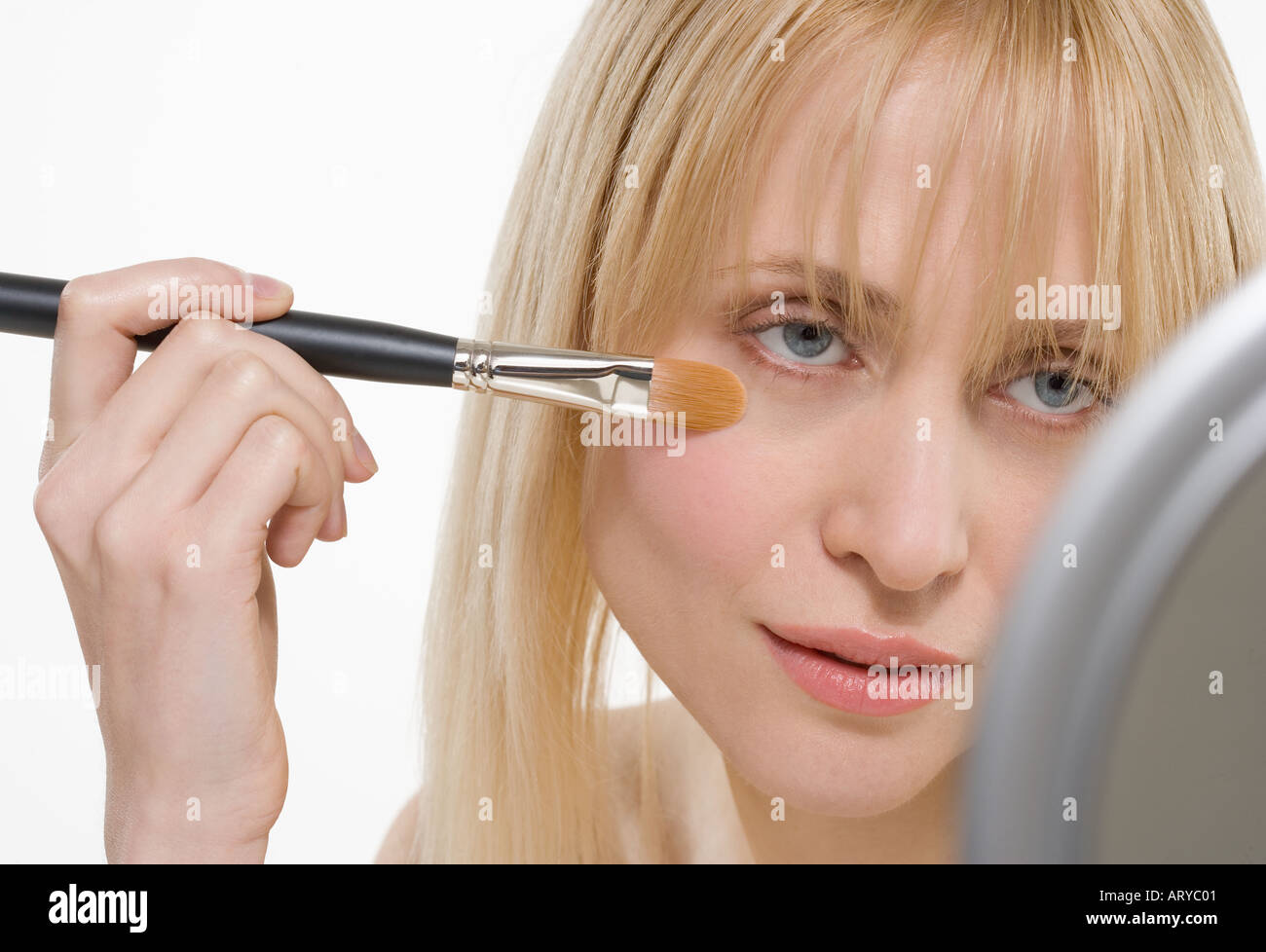 Woman gazing into mirror hi-res stock photography and images - Alamy