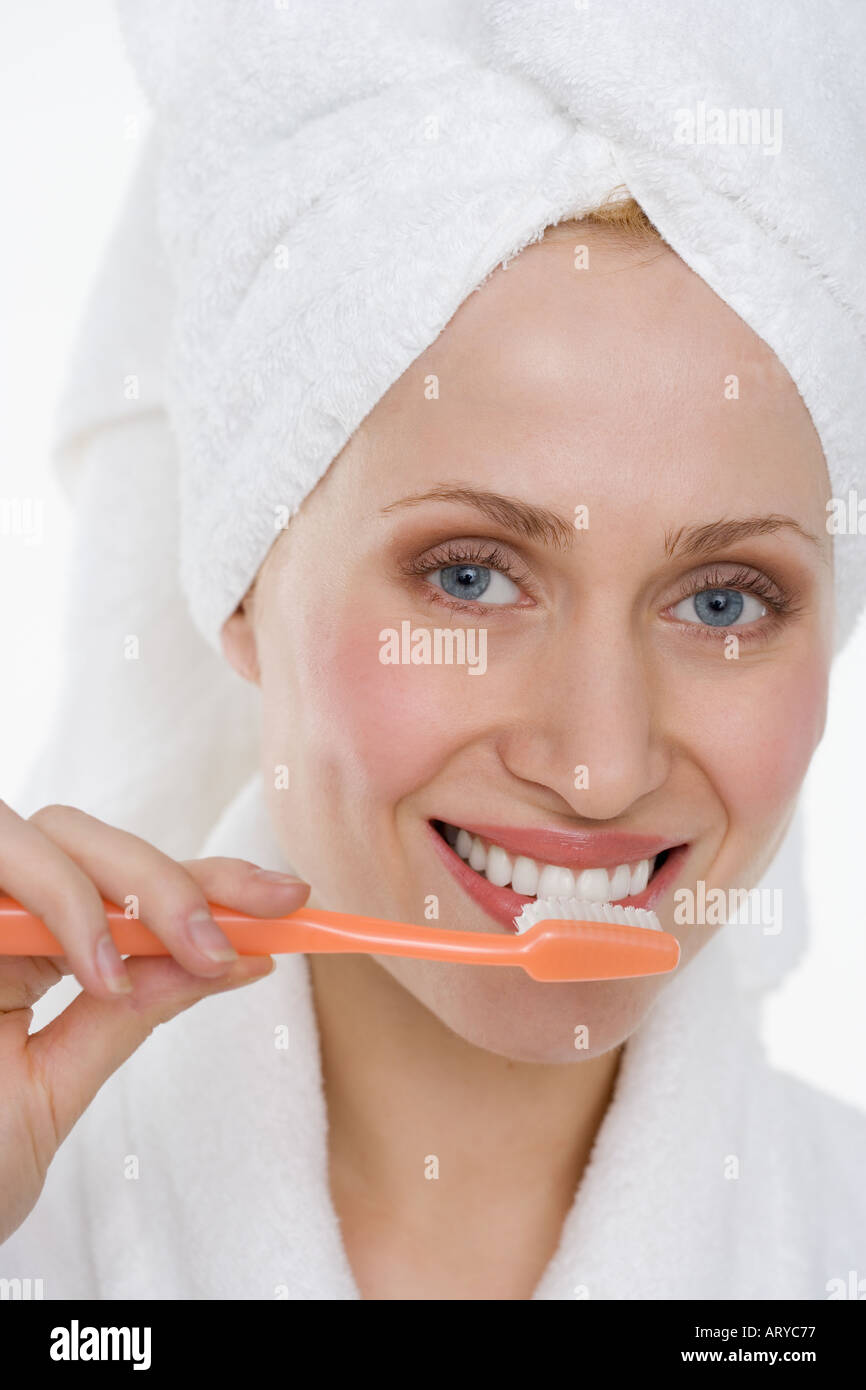 Woman brushing teeth Stock Photo - Alamy