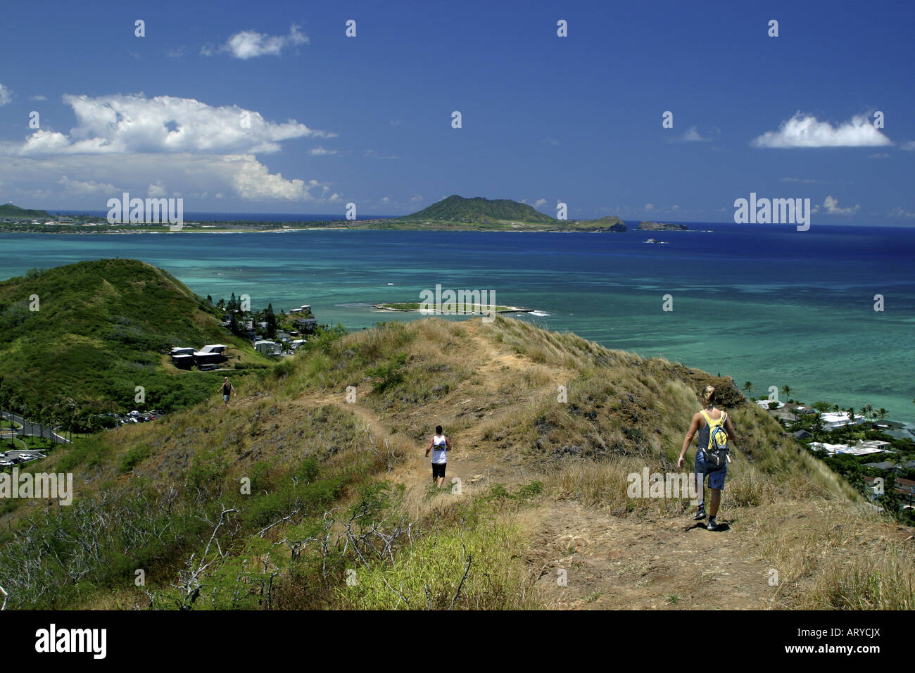 Hikers enjoy a spectacular view of Kailua Bay and Lanikai beach from ...