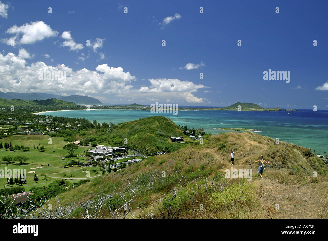 Hikers enjoy a spectacular view of Kailua Bay and Lanikai beach from ...