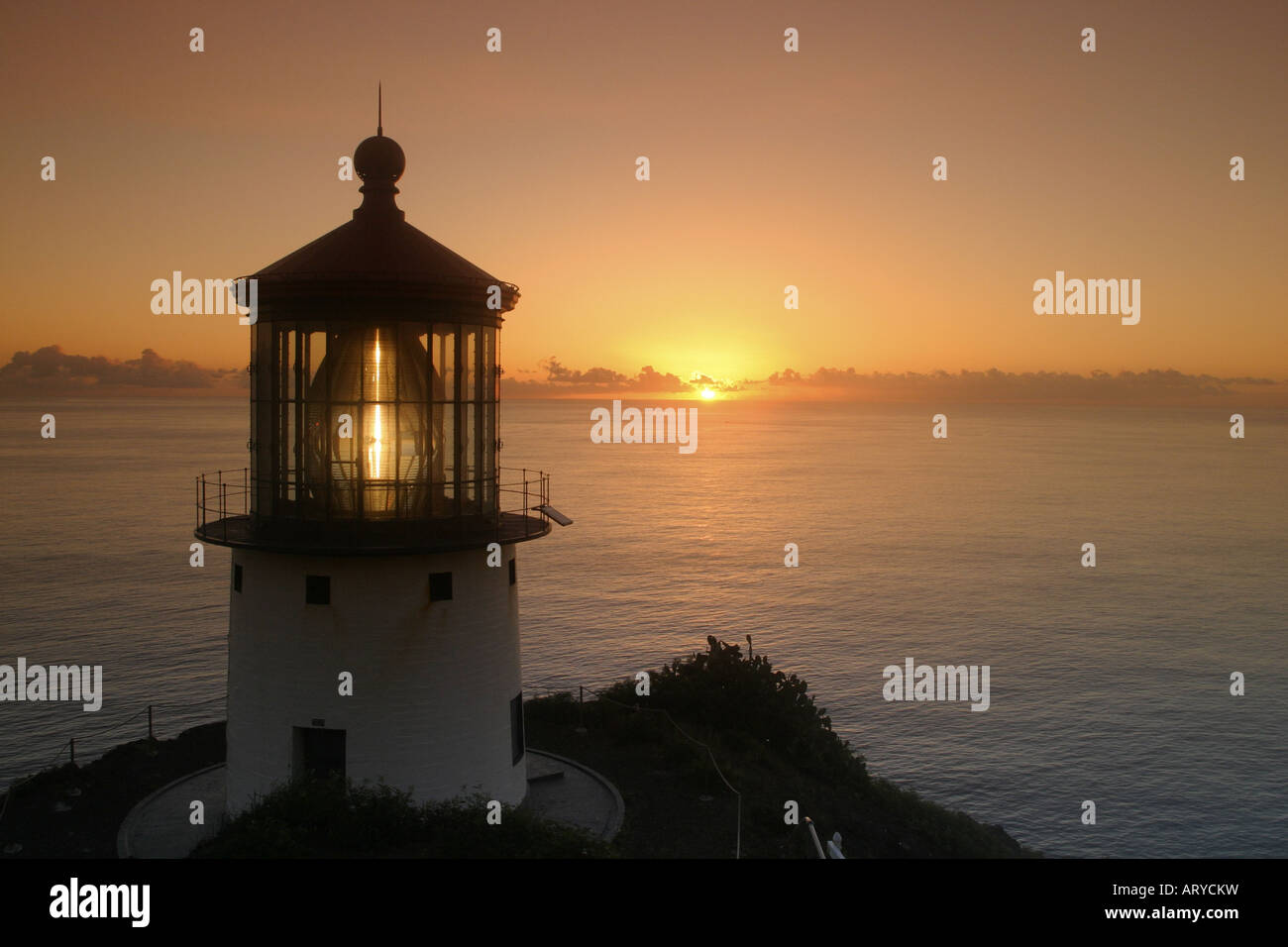 Makapuu pt. lighthouse at sunrise. Located along the southeast coast of ...