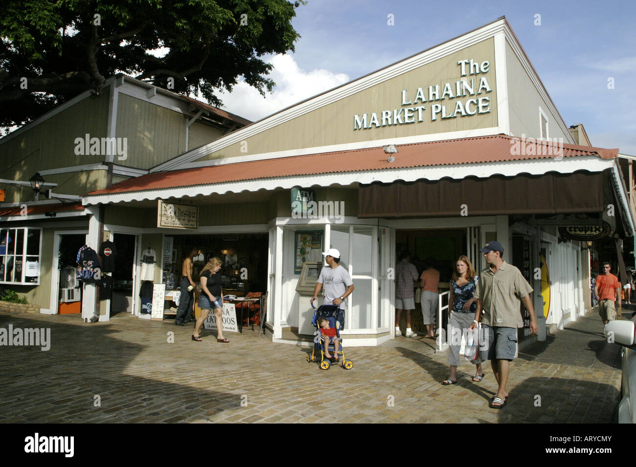 Tourists love to shop at the Lahaina Marketplace. Located on Front ...