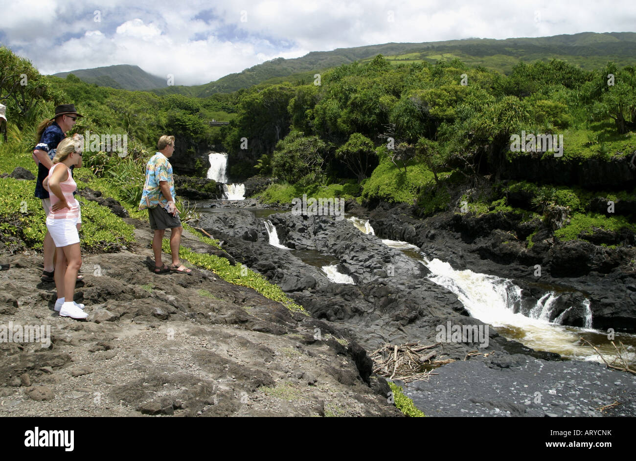 Visitors to Hana stop to see the famous Seven Sacred Pools Stock Photo ...