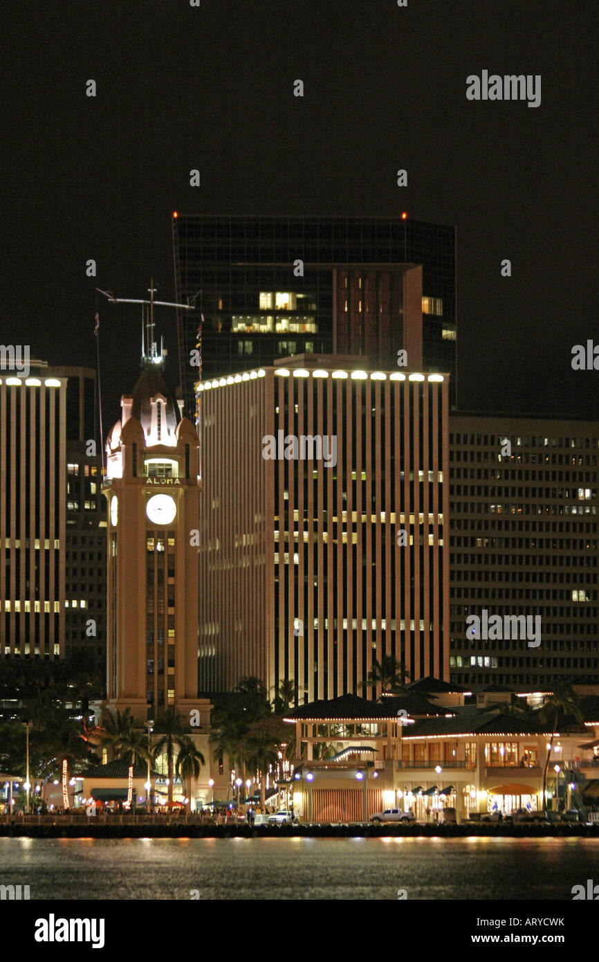 Night photo of Aloha tower and Aloha tower marketplace along Honolulu ...