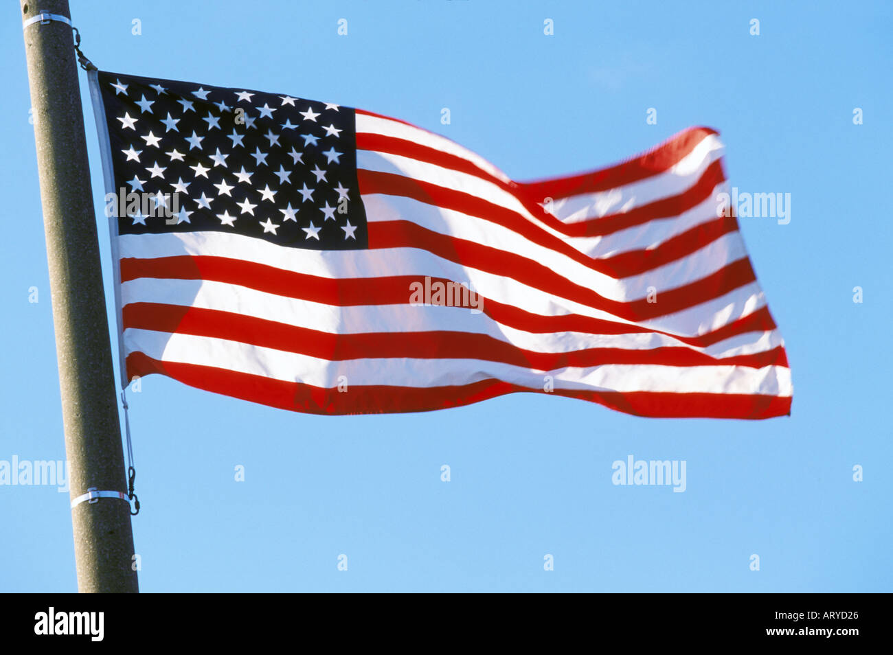 American flag flying in the breeze Stock Photo - Alamy