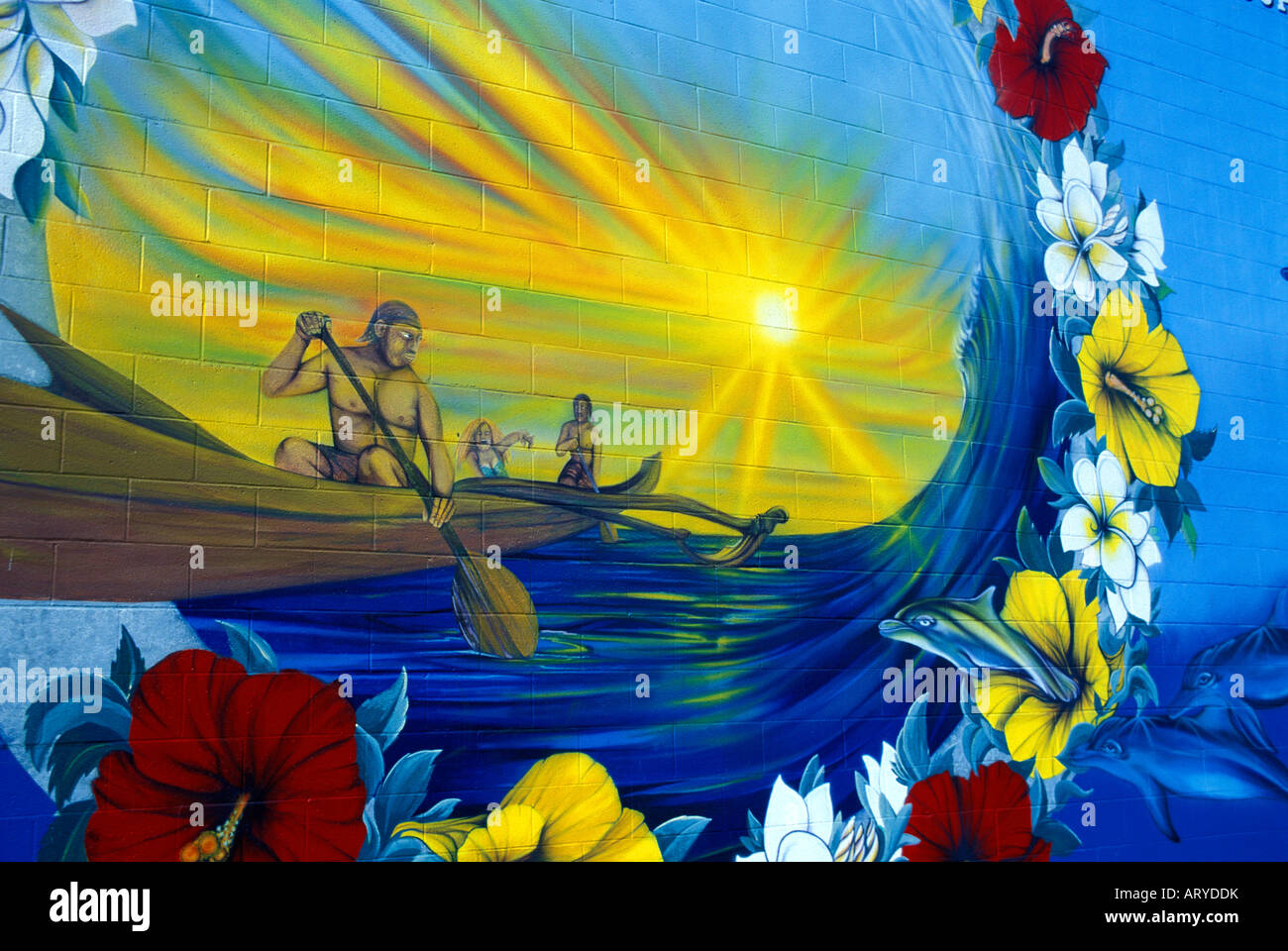 A colorful wall mural depicts the hawaiian outrigger canoe and ...