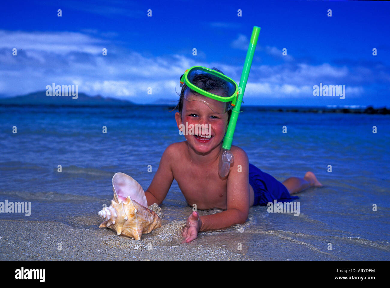 Playing a conch hi-res stock photography and images - Alamy