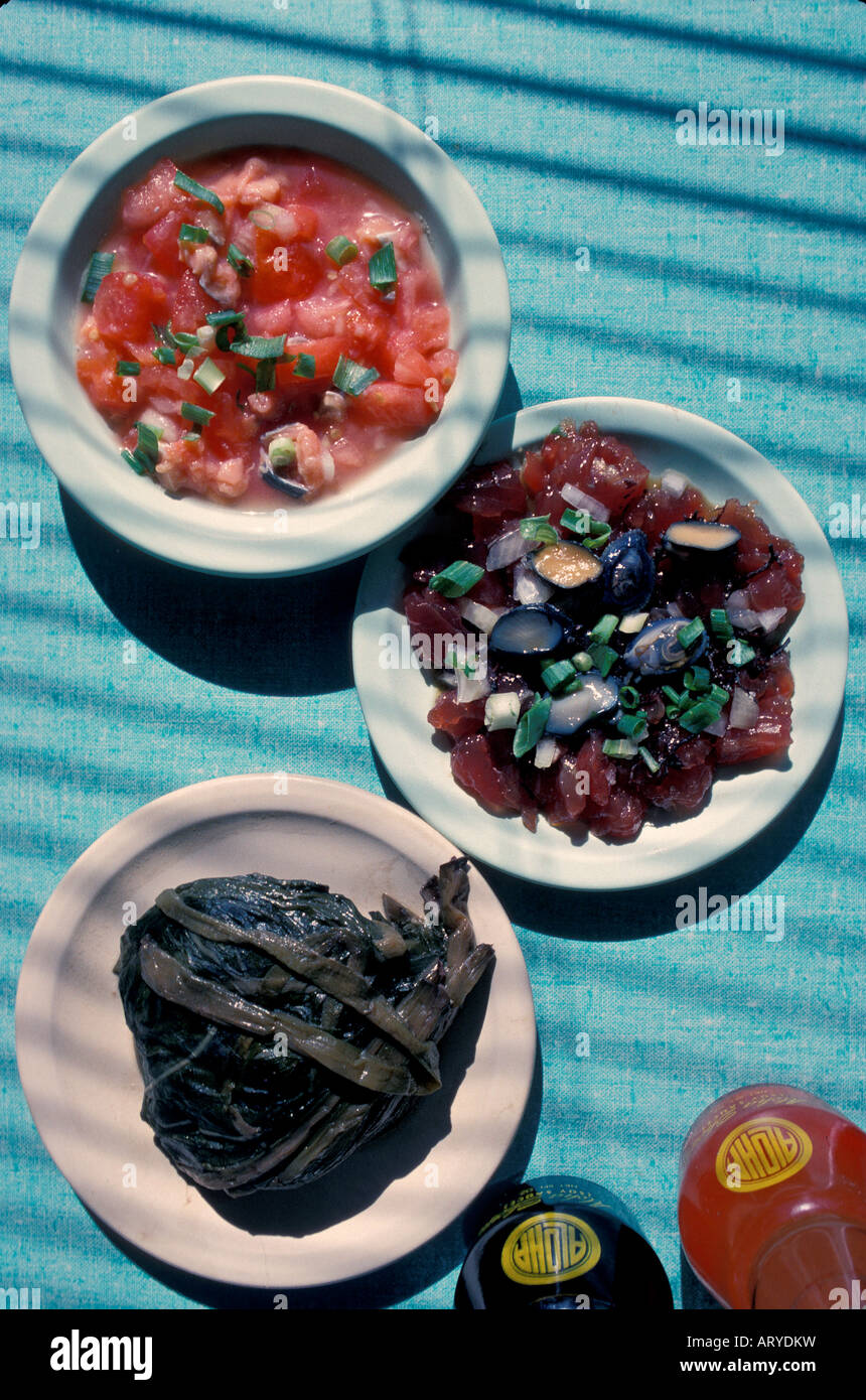 Hawaiian luau food: lomi salmon, poke and lau lau Stock Photo - Alamy