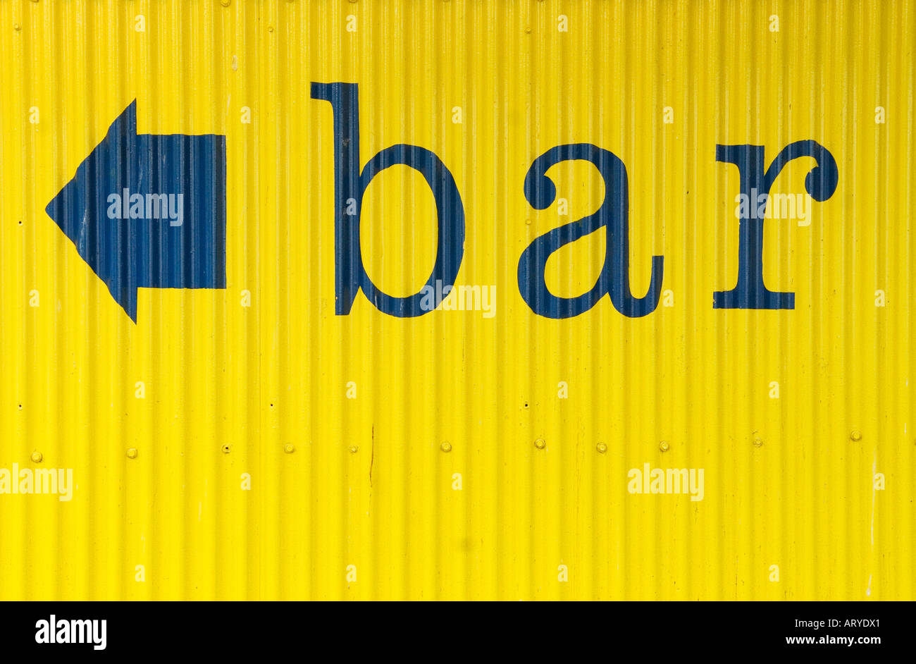 Yellow sign for a Bar Stock Photo - Alamy
