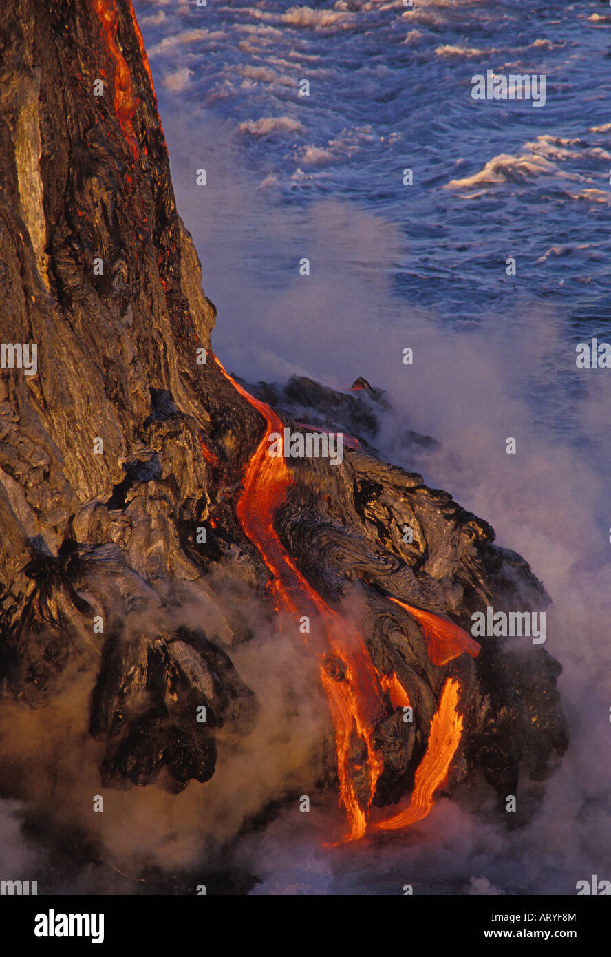 Lava flow reaching the sea, Hawaii Volcanoes National Park Stock Photo ...