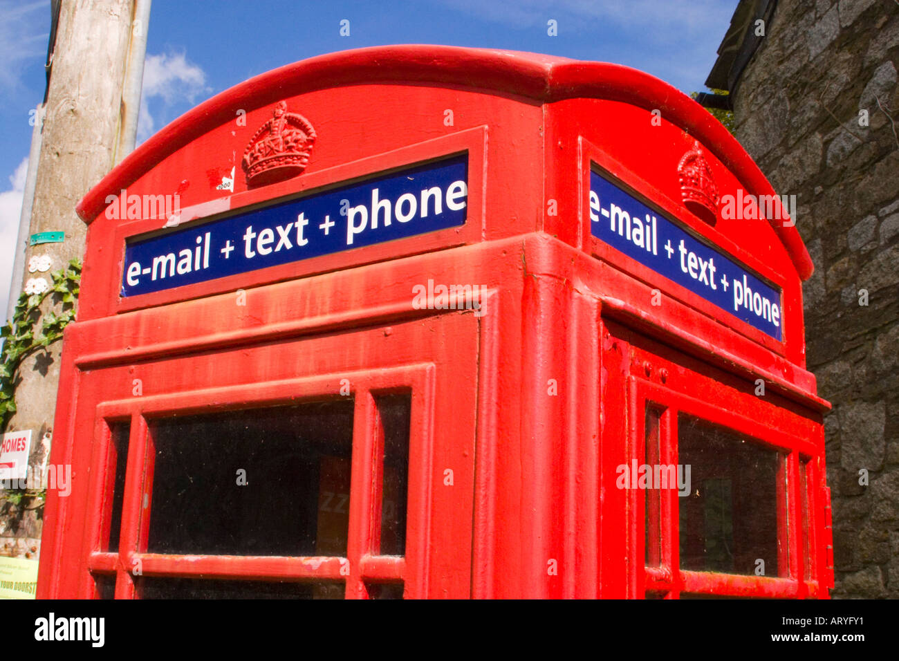 Traditional red telephone box offering email and texting services for ...
