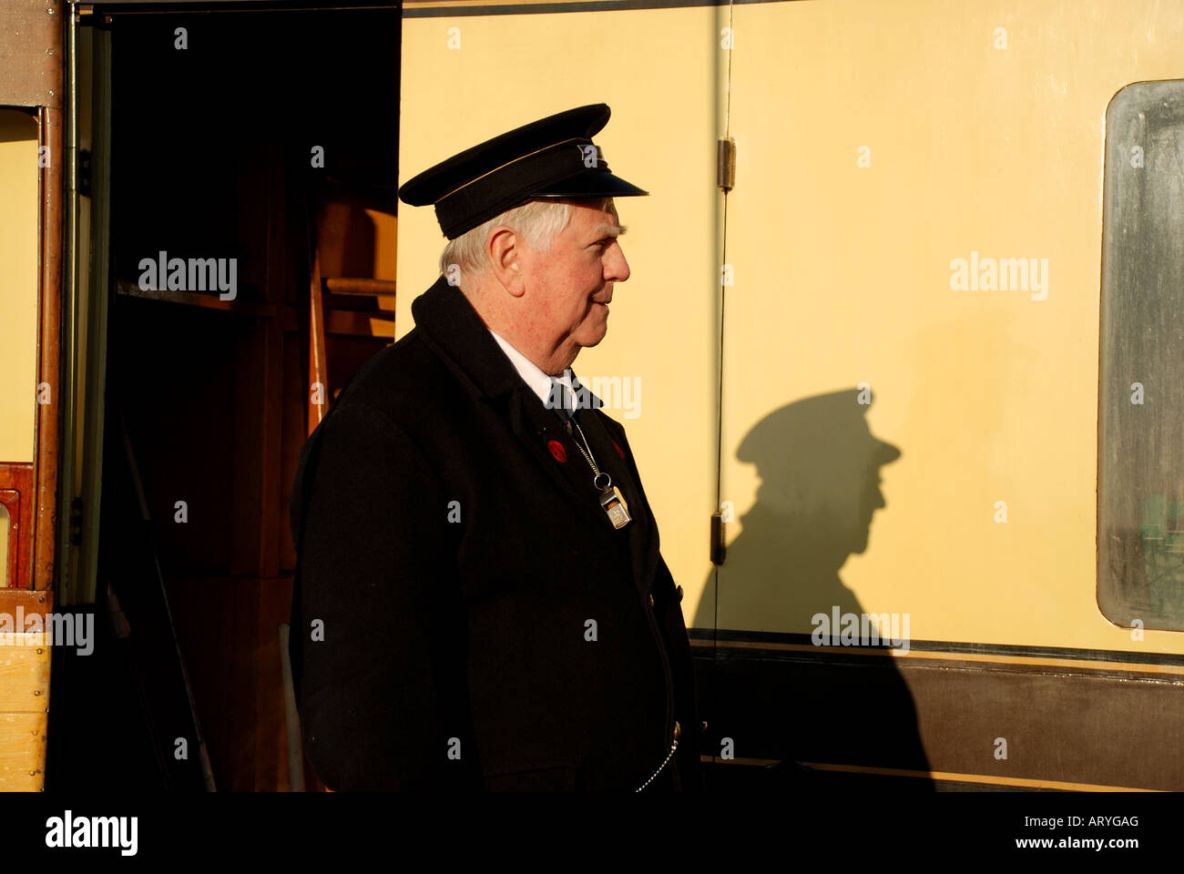 Train guard in period uniform Stock Photo - Alamy