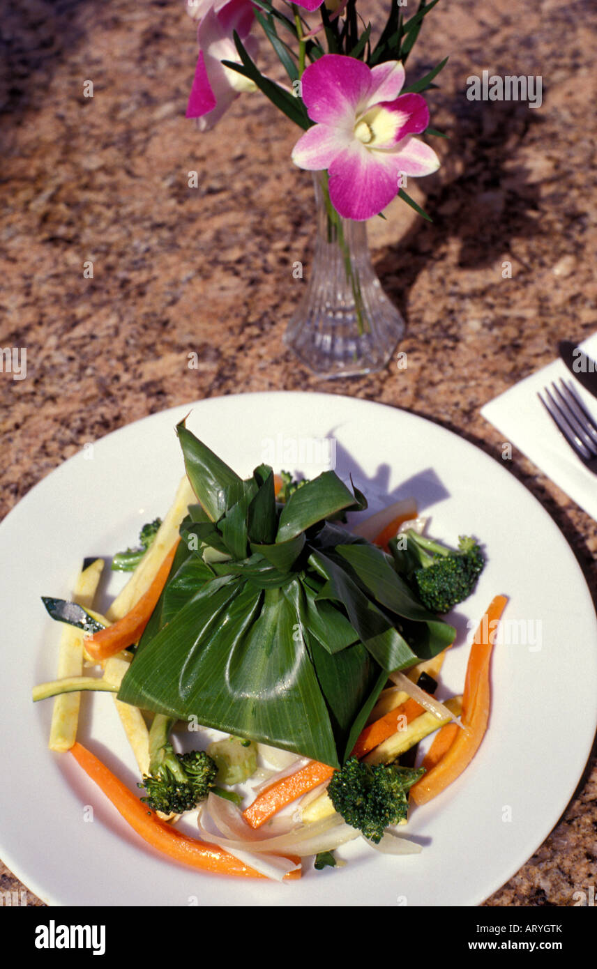 A presentation of lau lau, a Hawaiian meal of pork, chicken or fish and ...