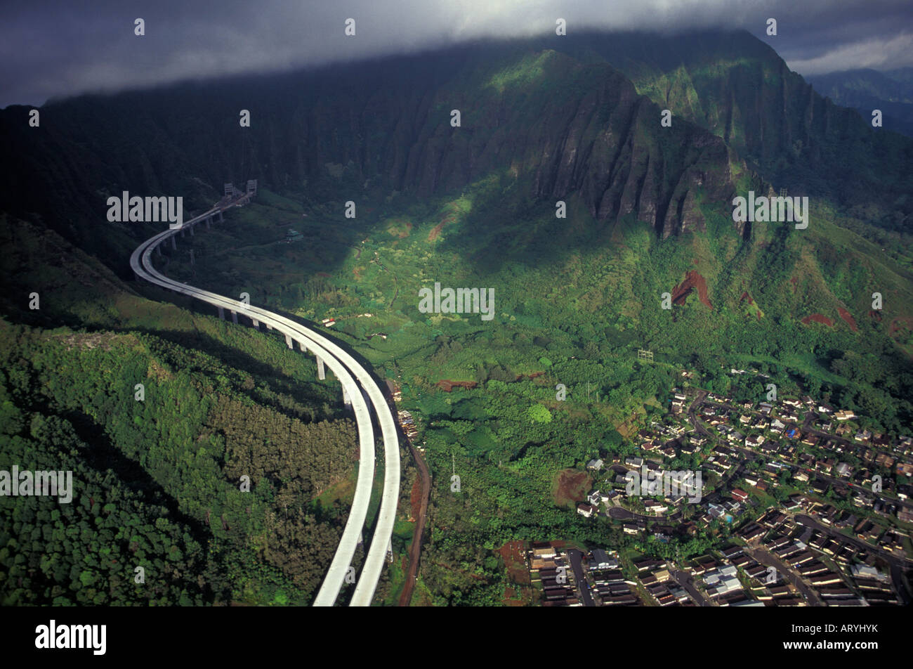 Aerial of the H3 highway, the Koolau Mountains, and a Kaneohe ...