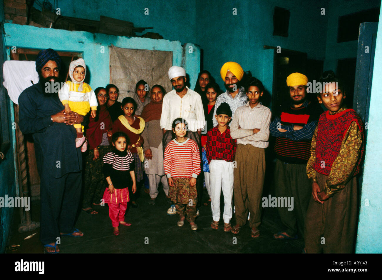 Amritsar India Large Sikh Family At Home Stock Photo - Alamy