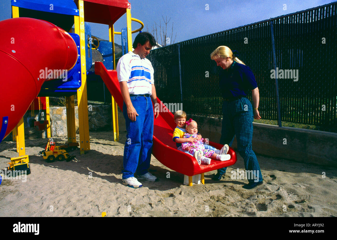Salt Lake City Utah USA Family with Children in Playground on Slide ...