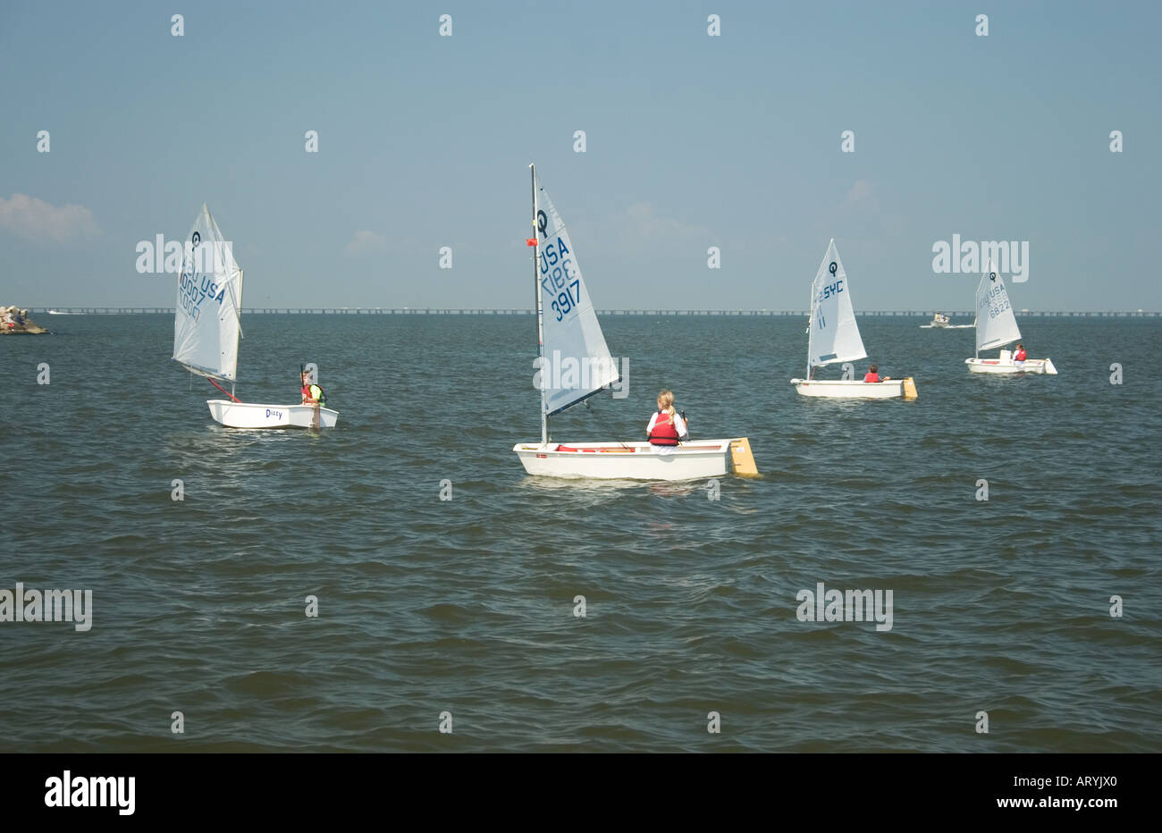 Children learning to sail on Lake Pontchartrain off the docks of the ...