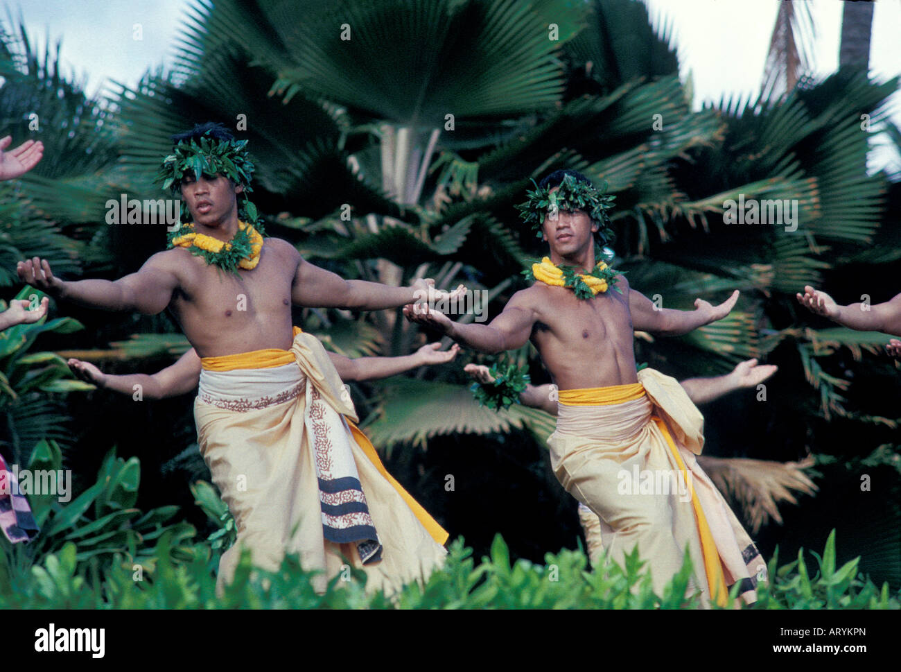 EDITORIAL ONLY. Men performing hula at Lanikuhonua, Oahu Stock Photo ...