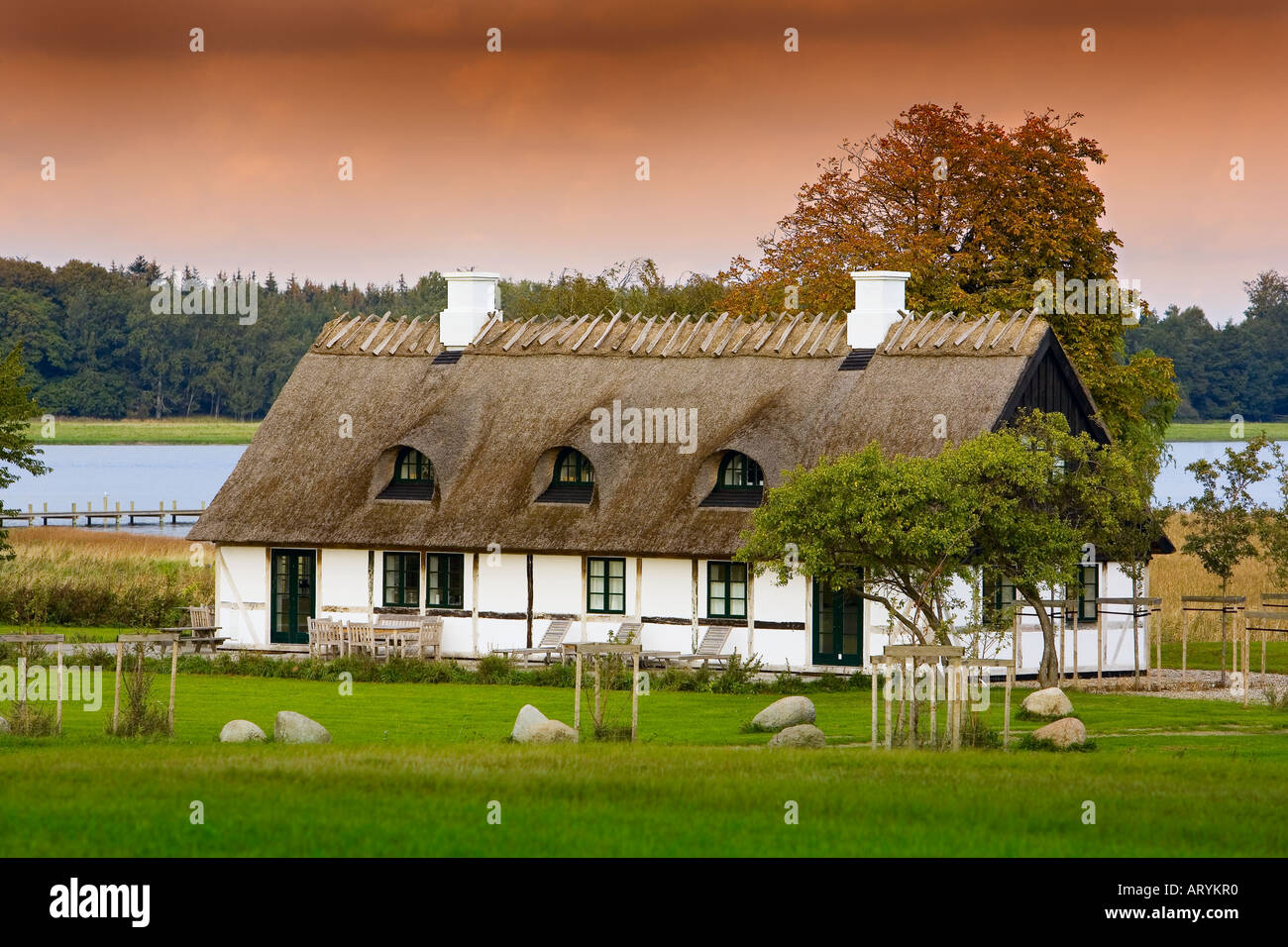 Rural thatched house Stock Photo - Alamy