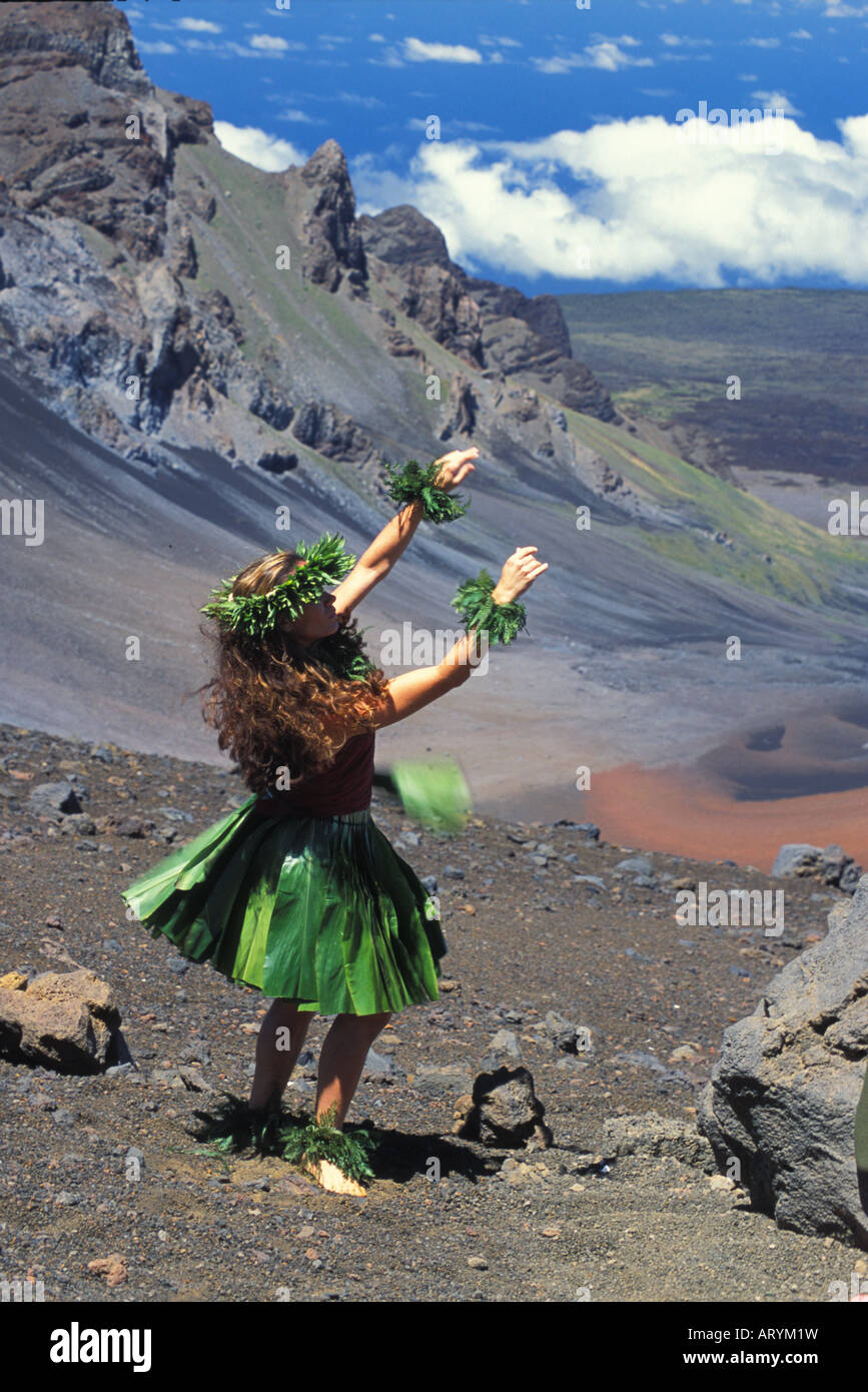 Native woman dancing hula with ipu (gourd) at Haleakala crater, island ...