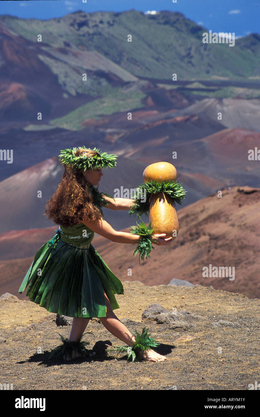 Native woman dancing hula with ipu (gourd) at Haleakala crater, island ...