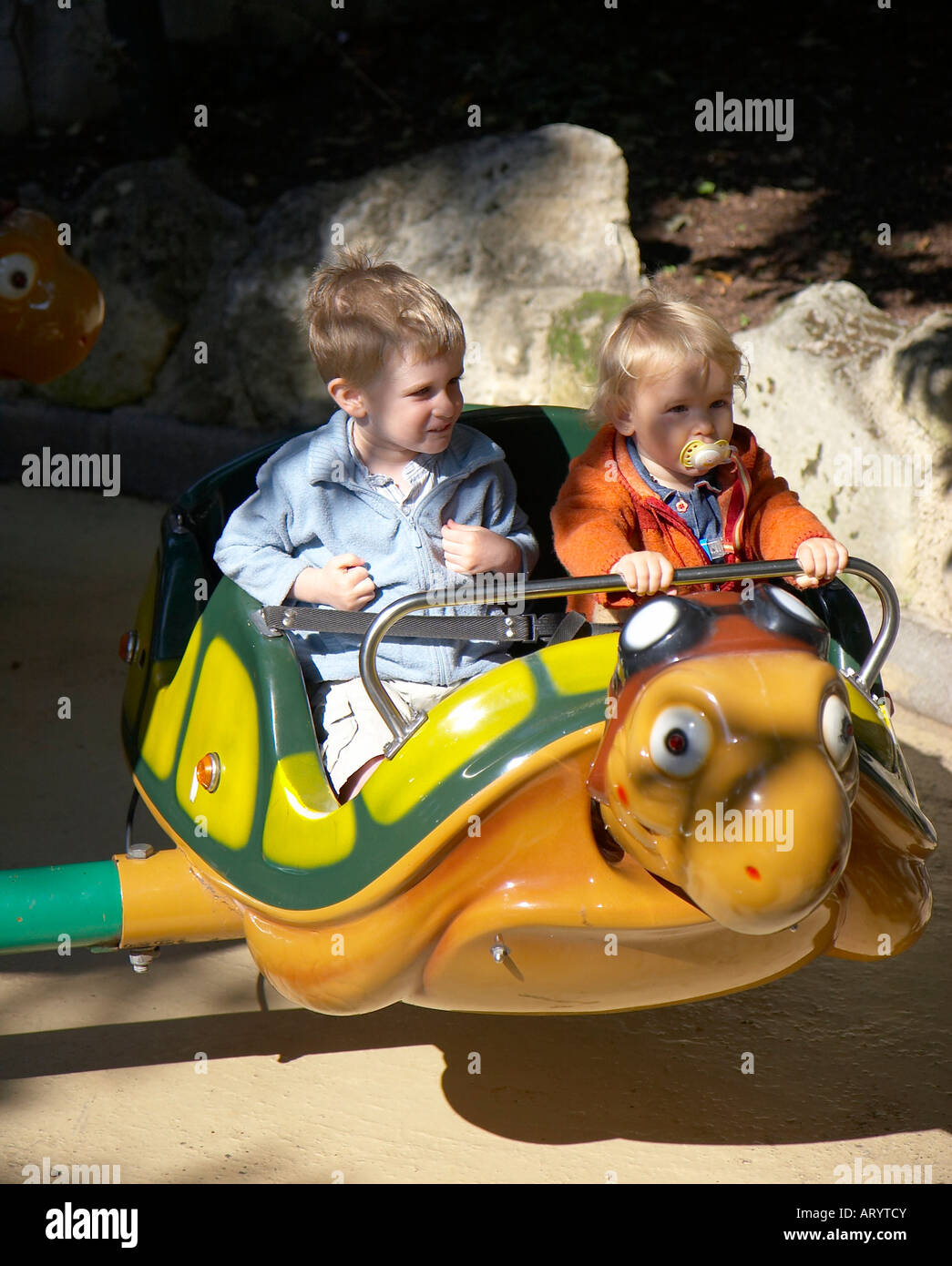 children in carousel Stock Photo - Alamy