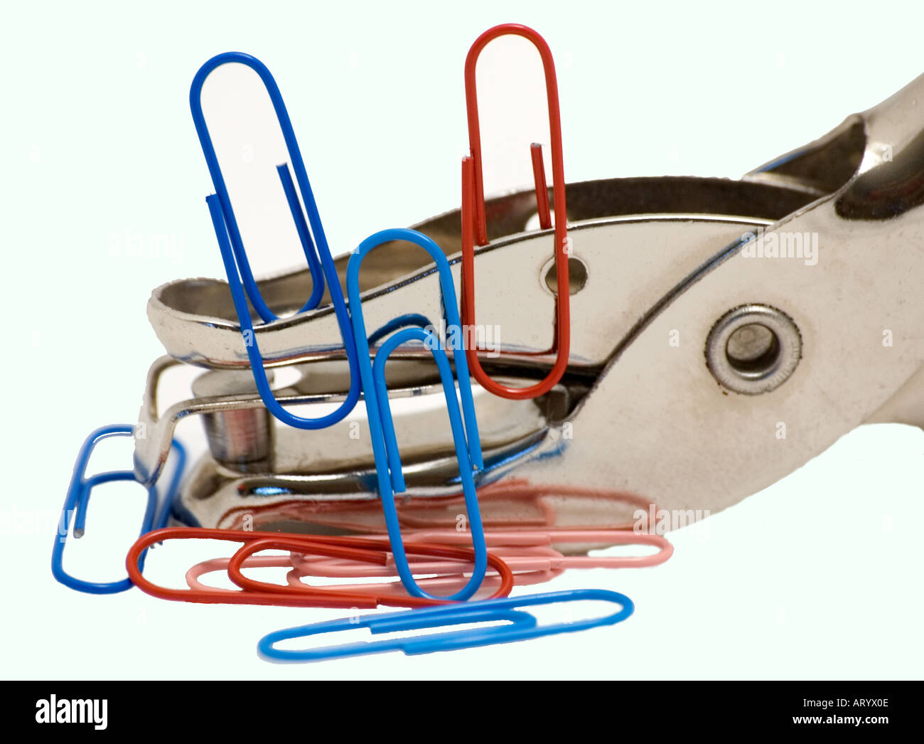 hole punch and paper clips Stock Photo - Alamy