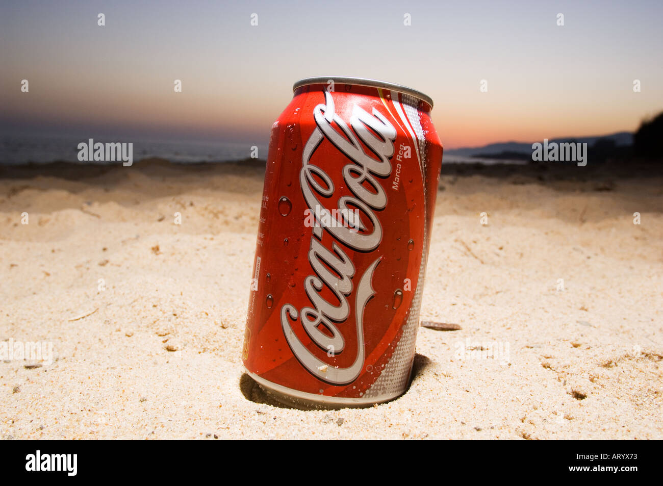 A can of coca cola at the beach Stock Photo - Alamy