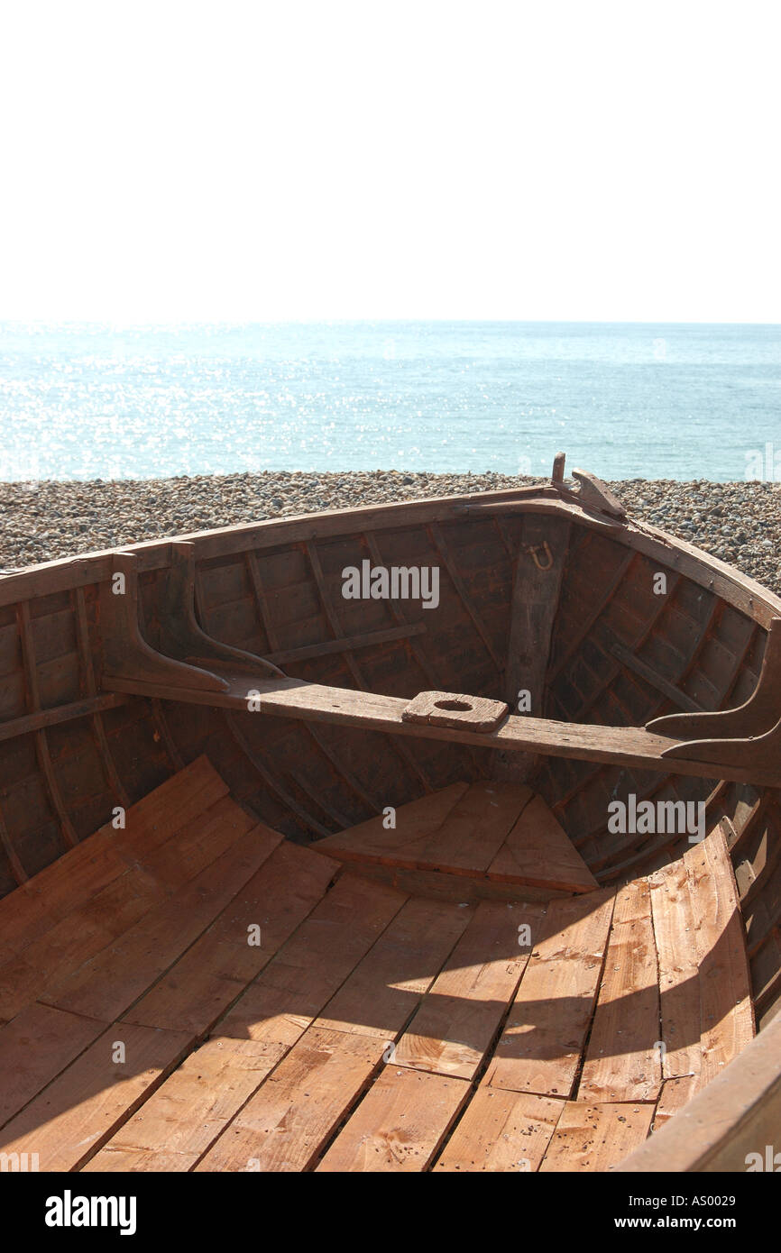 Interior of a wooden rowing boat looking off into the distance Stock ...