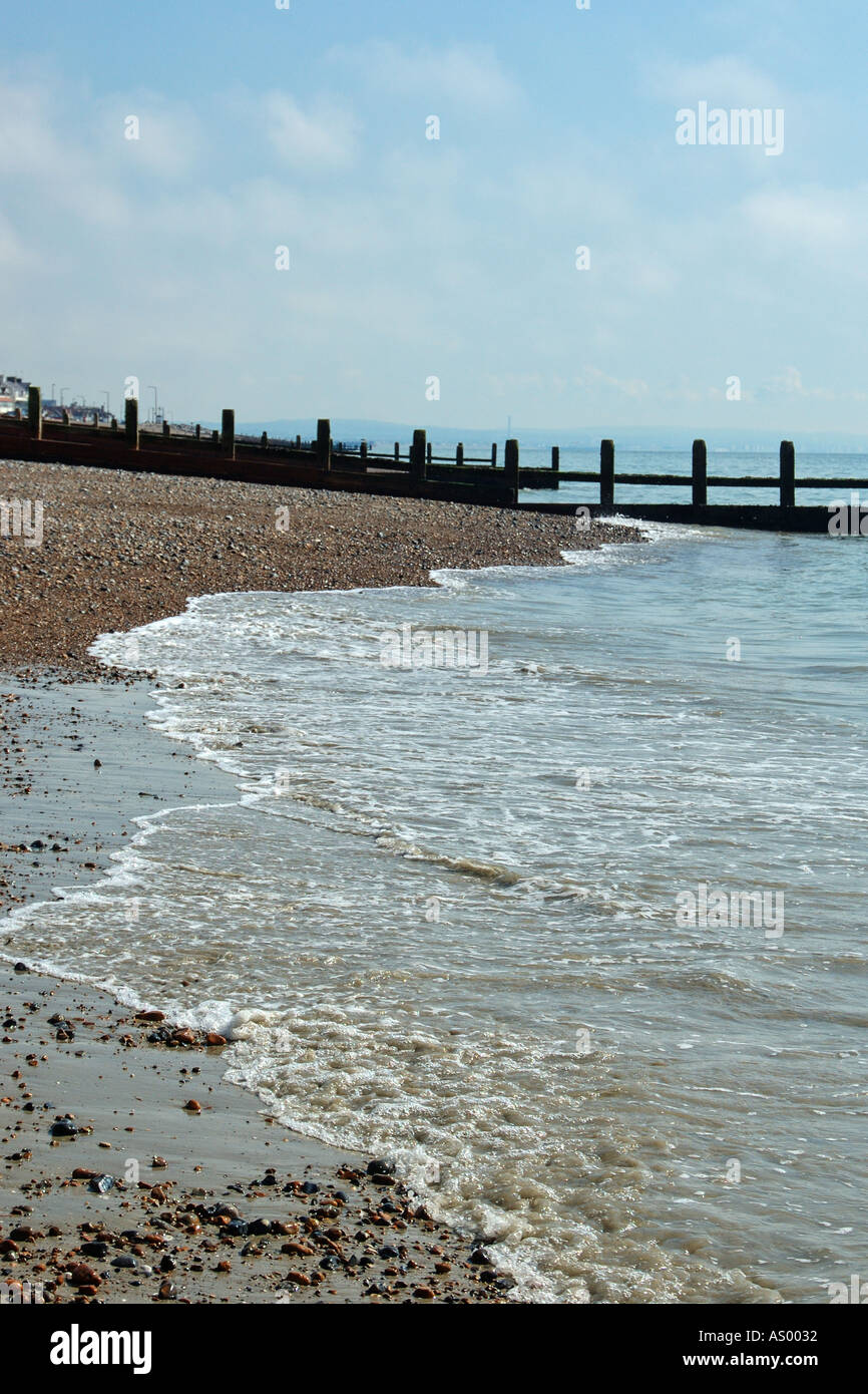 Beach showing waves Low perspective stretching into distance Stock ...