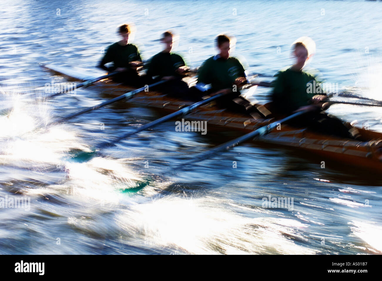 a four man rowing boat Stock Photo - Alamy