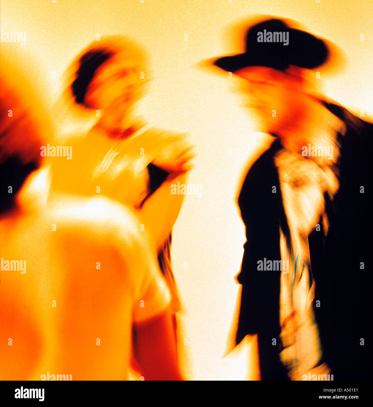 young people in yellow light Stock Photo - Alamy