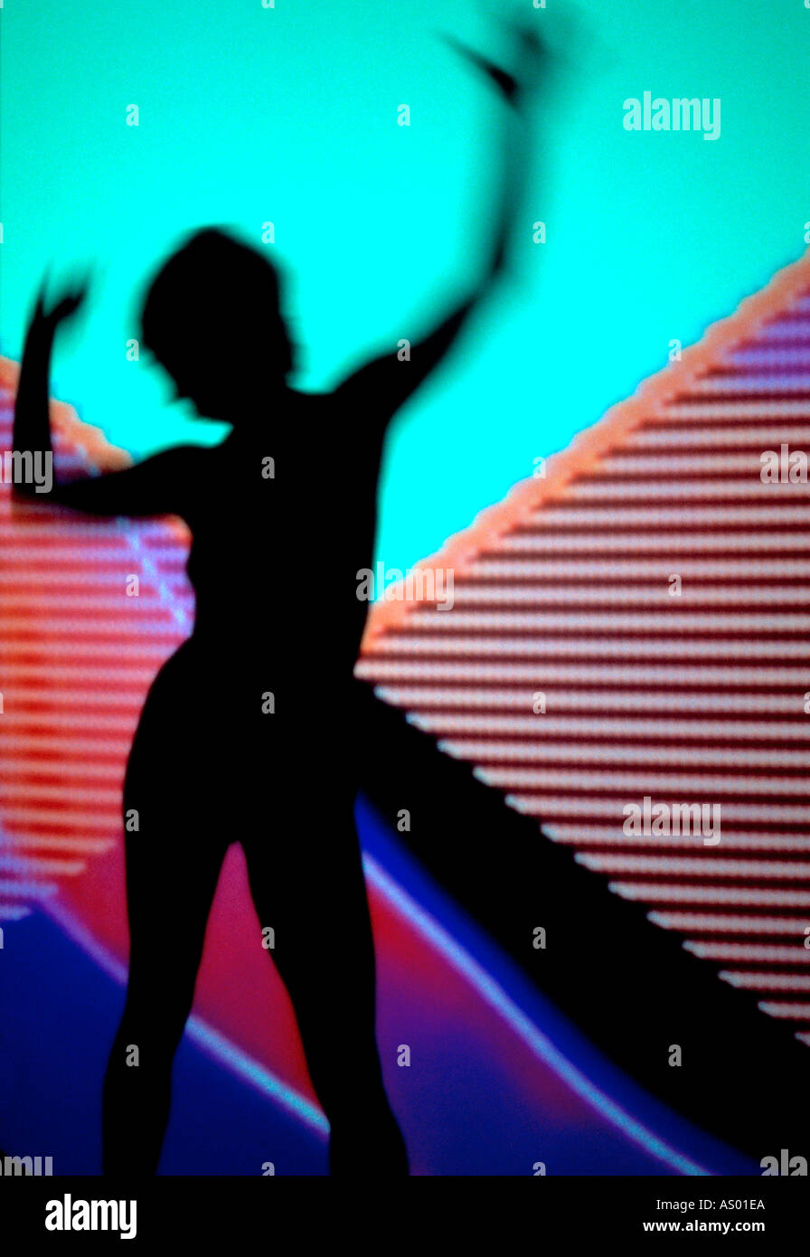 shadow of a dancer with coloured light around James Bond style Stock ...